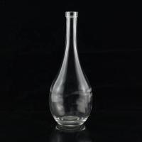 China Acid Etch Surface Handling Tequila Glass Bottles with Round Neck and Empty Flint for sale