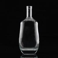 China Acid Etch Surface Handling Tequila Glass Bottles with Round Neck and Empty Flint for sale