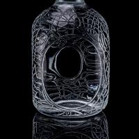 China Glass Round Carved 700ml 750ml Vodka Glass Bottle Wine Bottle With Cork Sealing Type for sale
