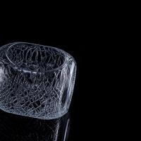 China Glass Round Carved 700ml 750ml Vodka Glass Bottle Wine Bottle With Cork Sealing Type for sale