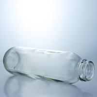 China Collar Material Glass 350ml Round Shaped Glass Bottle with Unique Custom Logo Screw Cap for sale