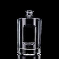 China Customized Shape 750ml Vodka Glass Bottle with Cork Cap and Clear Finish in Round for sale