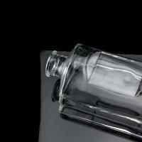 China Customized Shape 750ml Vodka Glass Bottle with Cork Cap and Clear Finish in Round for sale