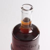 China Engraved Tequila Glass Bottle at 750ml 1 Liter with Round Shape and Cork Sealing Type for sale