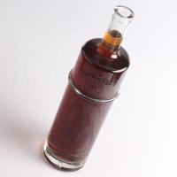 China Engraved Tequila Glass Bottle at 750ml 1 Liter with Round Shape and Cork Sealing Type for sale