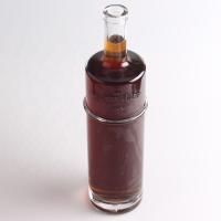 China Engraved Tequila Glass Bottle at 750ml 1 Liter with Round Shape and Cork Sealing Type for sale