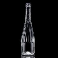 China Glass Body Material 500ml 700ml Whiskey Wine Bottle with Unique Bottom Raised Design for sale