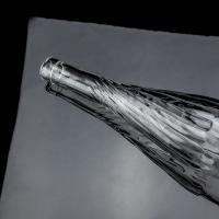 China Glass Body Material 500ml 700ml Whiskey Wine Bottle with Unique Bottom Raised Design for sale