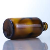 China 350ml Empty Glass Beer Bottle with Crown Cap Silk Screen and Hot Stamping Unique Design for sale