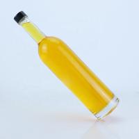 China Custom Logo 700ml 750ml High Flint Round Shape Glass Bottle with Screw Top Finish for sale