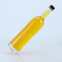 China Custom Logo 700ml 750ml High Flint Round Shape Glass Bottle with Screw Top Finish for sale