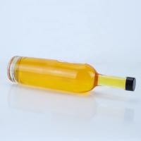China Custom Logo 700ml 750ml High Flint Round Shape Glass Bottle with Screw Top Finish for sale