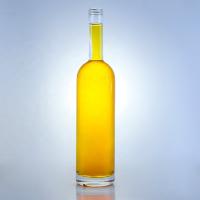 China Customized Logo 700ml 750ml High Flint Round Shape Glass Bottle with Screw Top Finish for sale