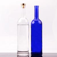 China 750ml Round Shape Glass Vodka Bottle with Cork Cap and Customized Surface Handing for sale