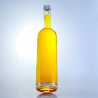 China Customized Logo 700ml 750ml High Flint Round Shape Glass Bottle with Screw Top Finish for sale