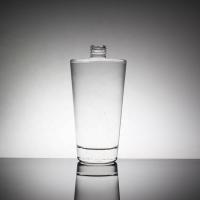 China Crystal Flint Glass 750ml Round Vodka Glass Bottles with Glass Collar Manufacturers for sale