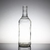 China Crystal Flint Glass 750ml Round Vodka Glass Bottles with Glass Collar Manufacturers for sale