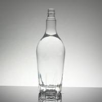 China Crystal Flint Glass 750ml Round Vodka Glass Bottles with Glass Collar Manufacturers for sale