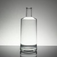 China Crystal Flint Glass 750ml Round Vodka Glass Bottles with Glass Collar Manufacturers for sale