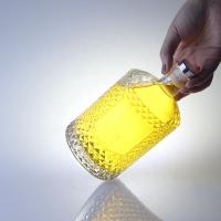 China 700ml Sophisticated Liquor Gin Bottle with GLASS Collar and Engraved Closure for sale