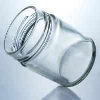 China Customized 500ml Wide Mouth Round Glass Honey Jar with Metal Cap and Glass Base Material for sale