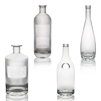 China Decal Unique Striped Glass Bottle for Vodka Gin Whiskey Rum Wine Cork 500ml 700ml 750ml for sale