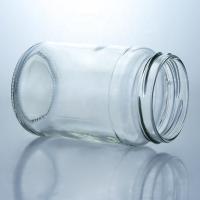 China Metal Lid Honey Jam Round Food Grade Glass Jar with Custom Straight Edge Clear Glass for sale
