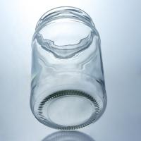 China Metal Lid Honey Jam Round Food Grade Glass Jar with Custom Straight Edge Clear Glass for sale