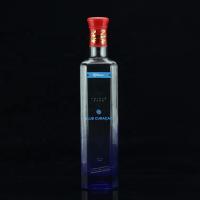 China 750ml Colorful Glass Liquor Bottle With Gold Collar Material and end Design for Vodka for sale