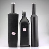 China 750ml Glossy Black Glass Vodka Painted Bottles Screen Printing Gin Closure Liquor Bottle for sale