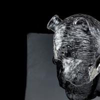 China Unique Design 500ml 750ml Monkey Head Shaped Glass Bottle for Vodka Liquor With Cork for sale