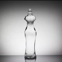 China Sexy Female Body Shaped Bottle Unique Glass Liquor Bottle With Crown Cap for sale