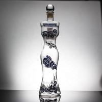 China Sexy Female Body Shaped Bottle Unique Glass Liquor Bottle With Crown Cap for sale
