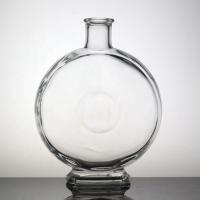 China Customized Surface Handing Football Shaped Glass Bottle for Unique Alcohol Beverage for sale