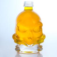 China Decal Surface Skull Shape Glass Liquor Bottle for Whisky Vodka Brandy Aging Technique for sale
