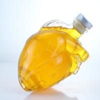 China Clear or Customized Heart Shape Glass Liquor Bottle for Beverage Whisky Vodka Brandy for sale