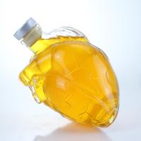 China Clear or Customized Heart Shape Glass Liquor Bottle for Beverage Whisky Vodka Brandy for sale