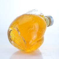China Clear or Customized Heart Shape Glass Liquor Bottle for Beverage Whisky Vodka Brandy for sale