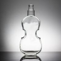 China Base Material Glass Bottle with Unique Letter Shape and Cork Cap for sale