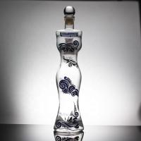 China Base Material Glass Bottle with Unique Letter Shape and Cork Cap for sale