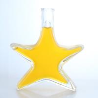 China Whiskey Gin Rum Vodka Glass Liquor Bottle Star Shape with Cork Top and Glass Base for sale