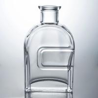 China Custom Squircle Glass Liquor Bottle for Gin Rum Brandy Vodka and Cork Stopper Included for sale