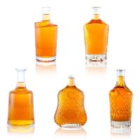 China 2023 Clear Bottle Glass Beverage Bottles with Frosted Base Material Customized Logo for sale