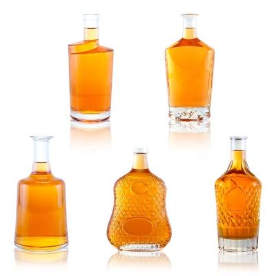 China 2023 Clear Bottle Glass Beverage Bottles with Frosted Base Material Customized Logo for sale
