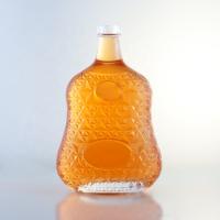 China 2023 Clear Bottle Glass Beverage Bottles with Frosted Base Material Customized Logo for sale