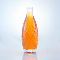 China Transparent Customized Liquor Glass Water Bottles with Unique Sealing Type SCREW CAP for sale