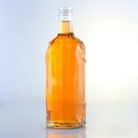 China Transparent Customized Liquor Glass Water Bottles with Unique Sealing Type SCREW CAP for sale