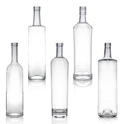 China Classic Round Glass Spirits Bottle with Customized Logo and Cork Stopper for sale