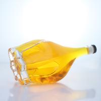 China Flint Glass Embossed Design Screw Cap Spirit Bottle for Whisky Vodka Tequila Gin Rum for sale