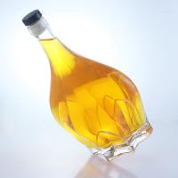 China Flint Glass Embossed Design Screw Cap Spirit Bottle for Whisky Vodka Tequila Gin Rum for sale